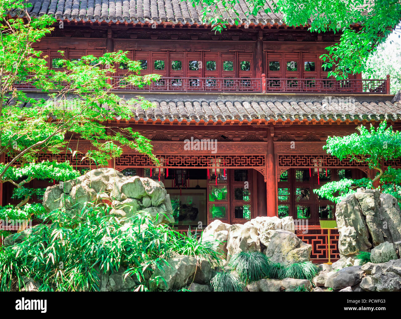Red temple, traditional chinese buildings and rocks at Yu Gardens ...