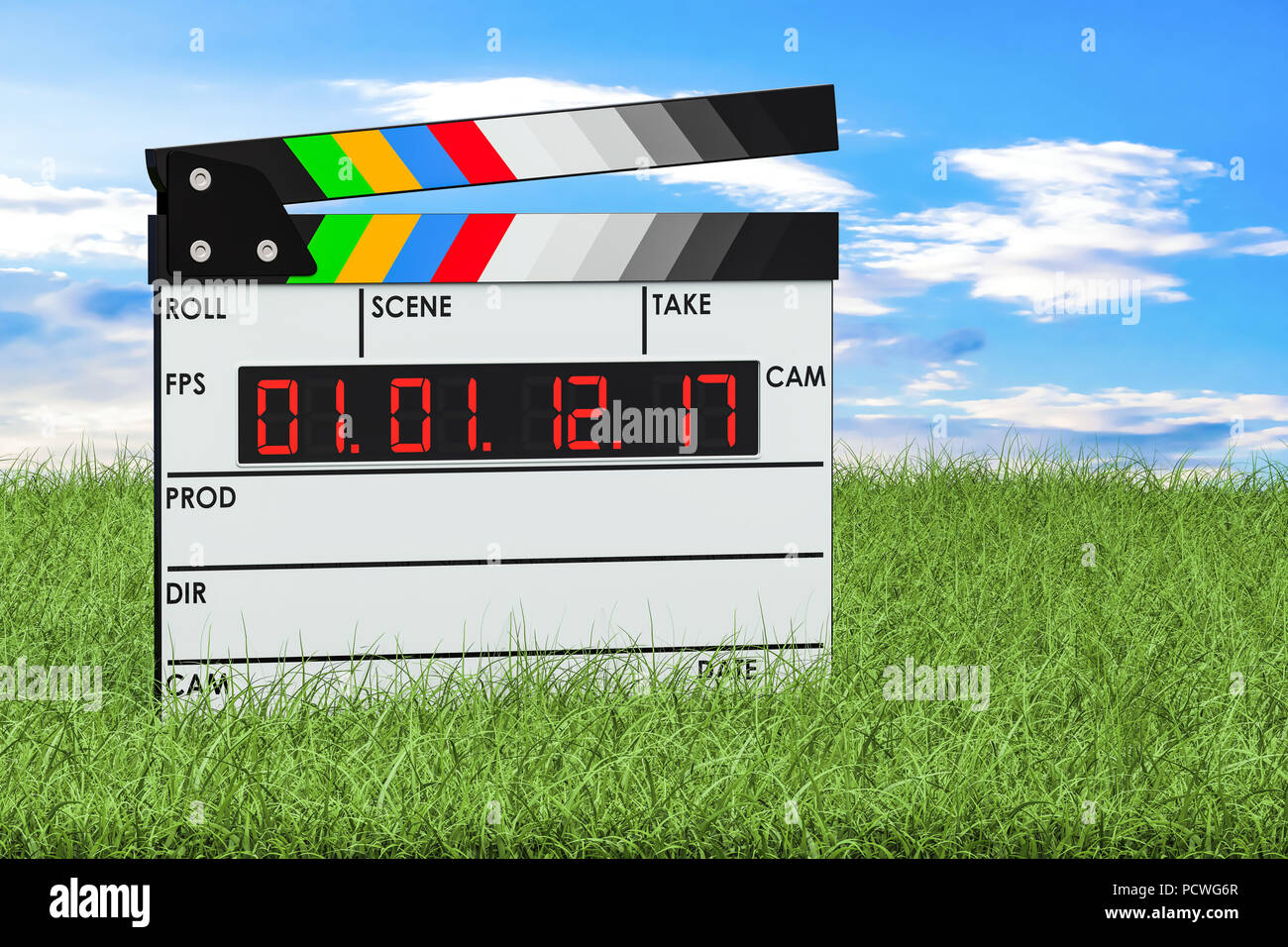 Digital movie clapper board on the green grass against blue sky, 3D ...