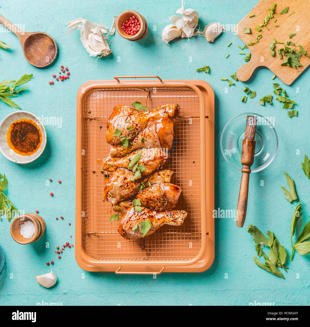 Cooking preparation of raw chicken drumsticks. Raw marinated Chicken ...