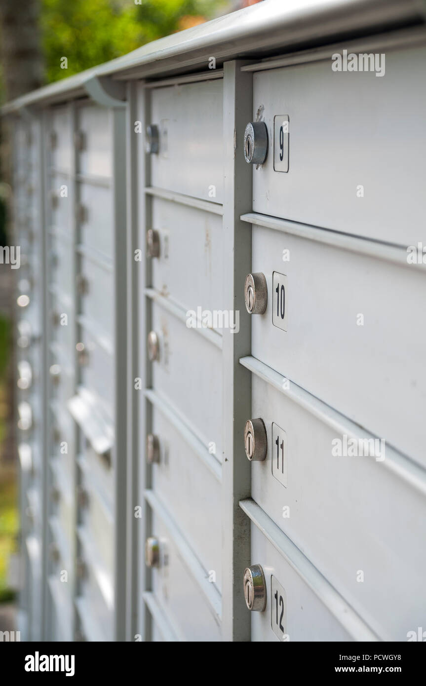 Community or neighborhood mailbox with compartments Stock Photo - Alamy