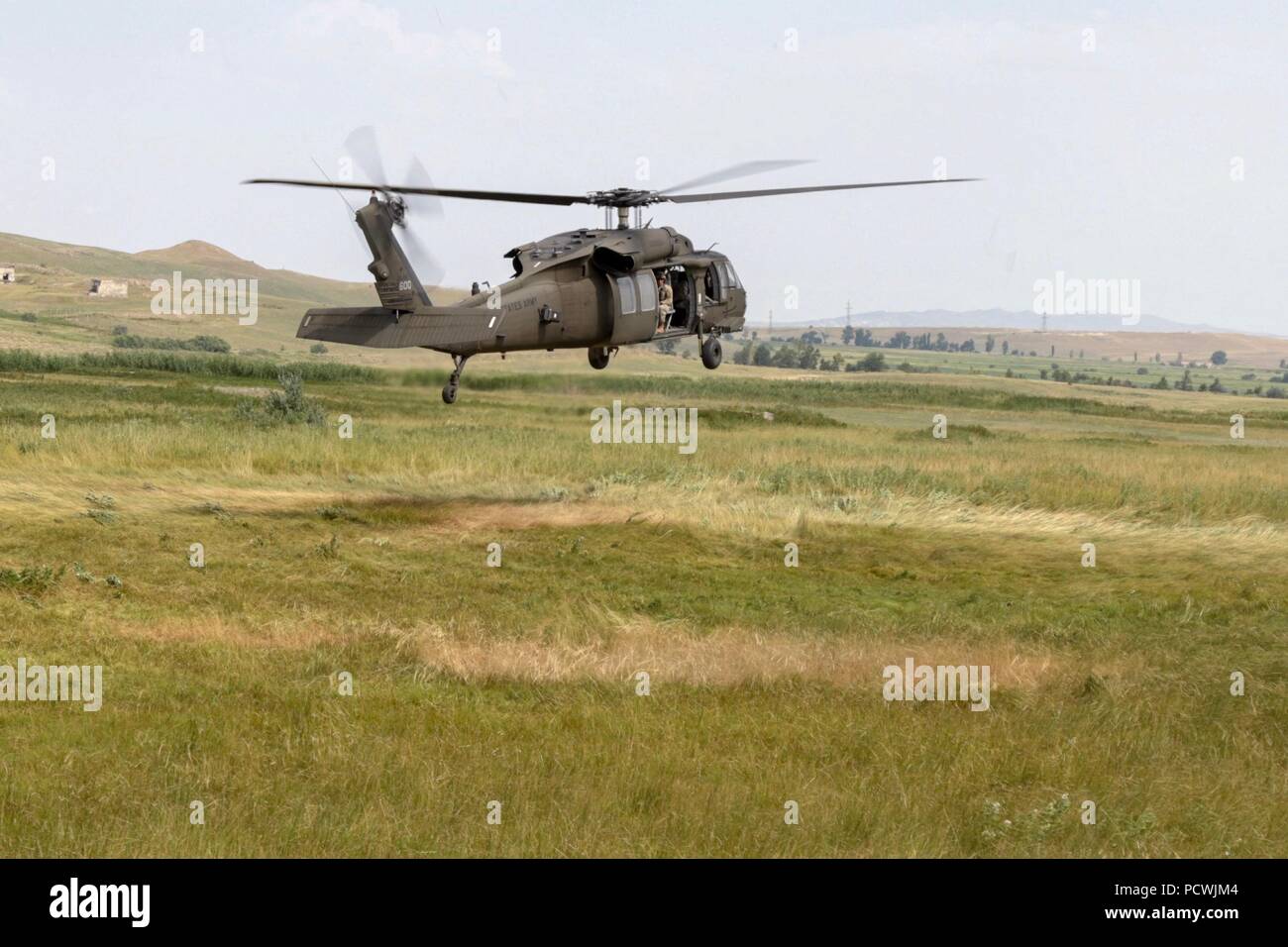 A Georgia Army National Guard UH-60 Black Hawk helicopter from the ...