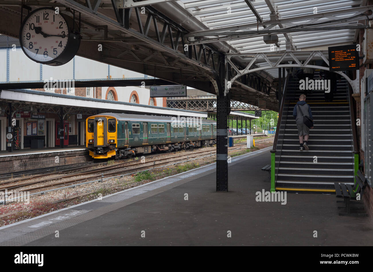 A First Great Western railway class 150 sprinter train by the station ...