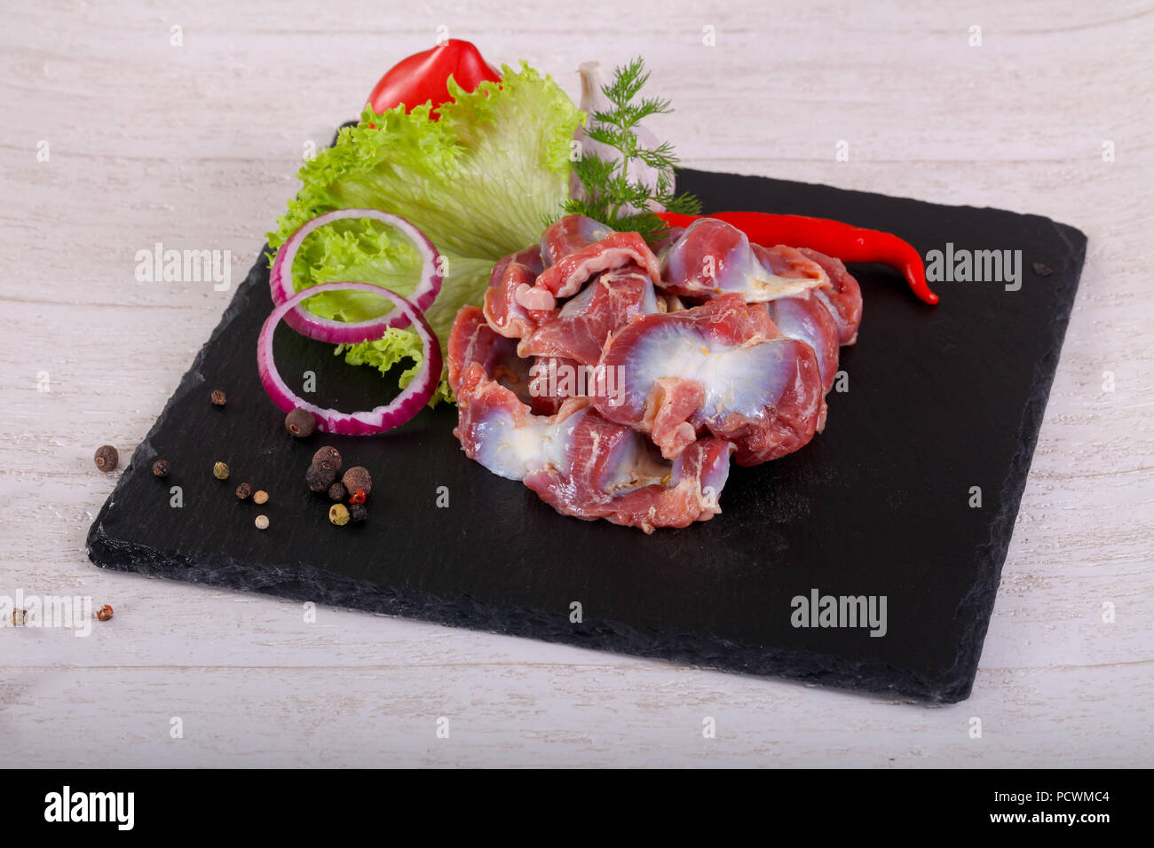 Raw chicken stomach for cooking Stock Photo - Alamy
