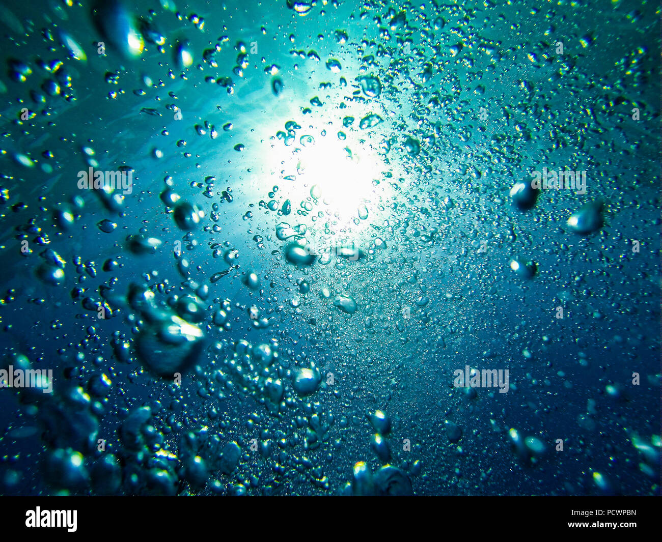 Air boobles in blue sea water. Maldives Stock Photo - Alamy