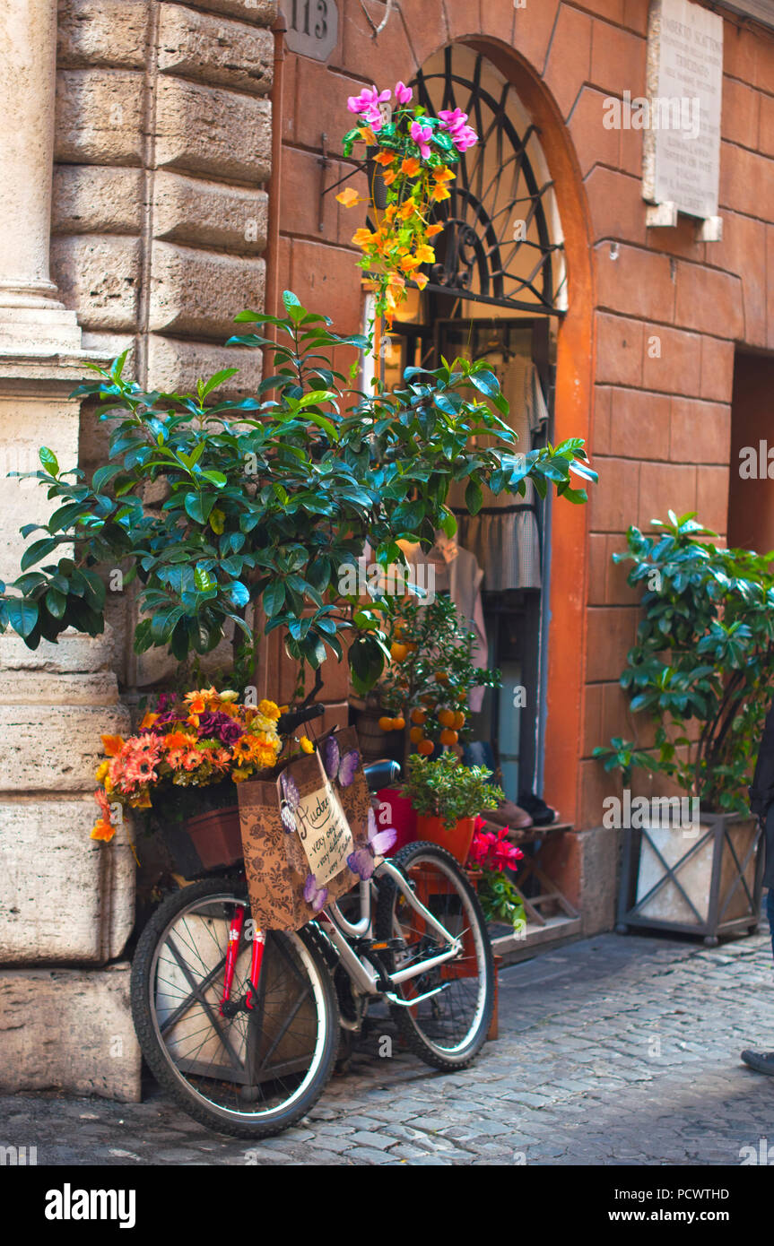Old streets of Europe. Decor of flowers. Italy Stock Photo - Alamy