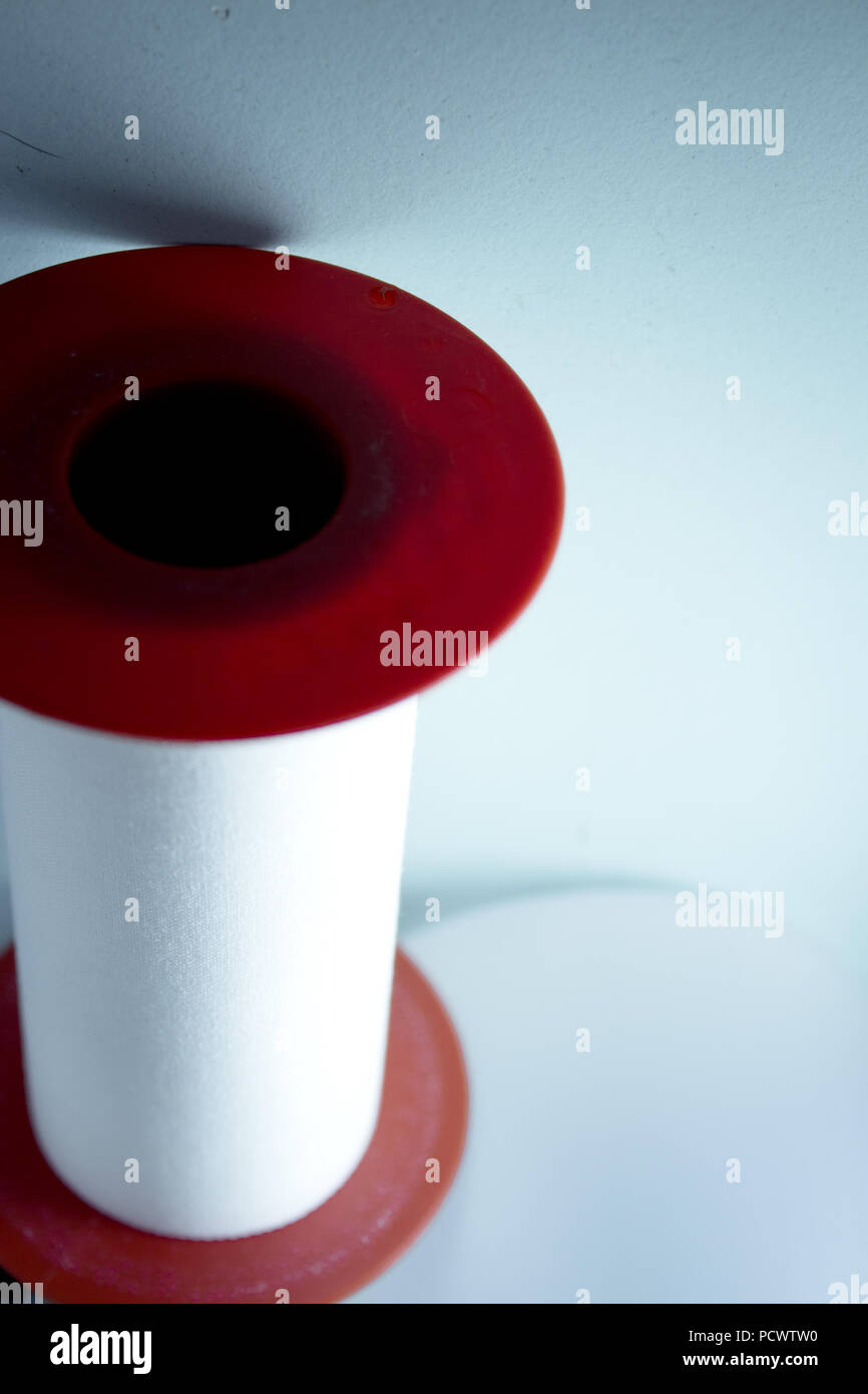 Roll of white plaster for medical use. No people Stock Photo - Alamy