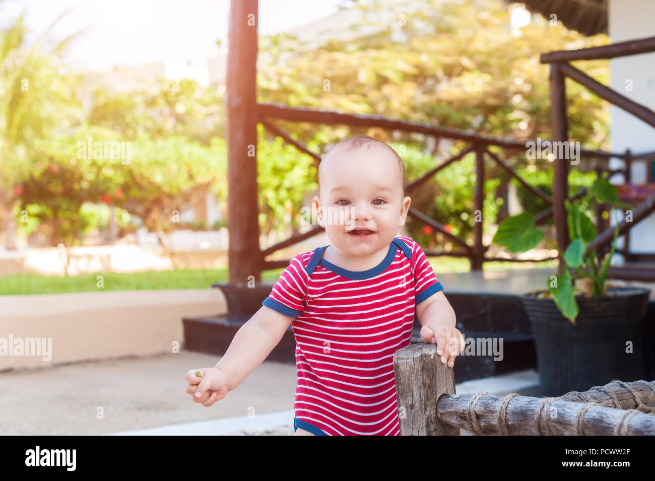 A kid with a cunning facial expression in a tropical country Stock ...