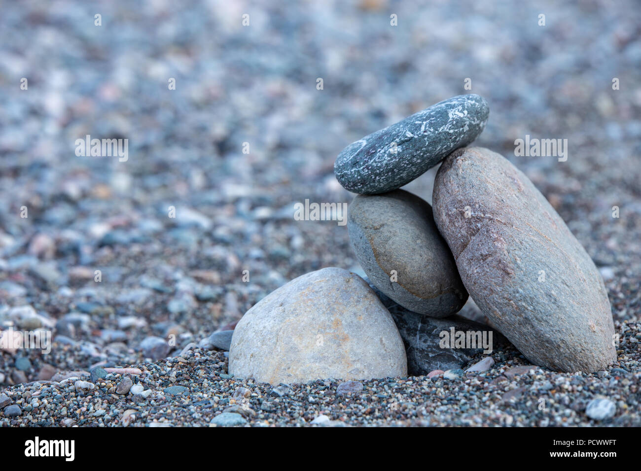 Pebbles on the sea shore. Pebble background Stock Photo - Alamy
