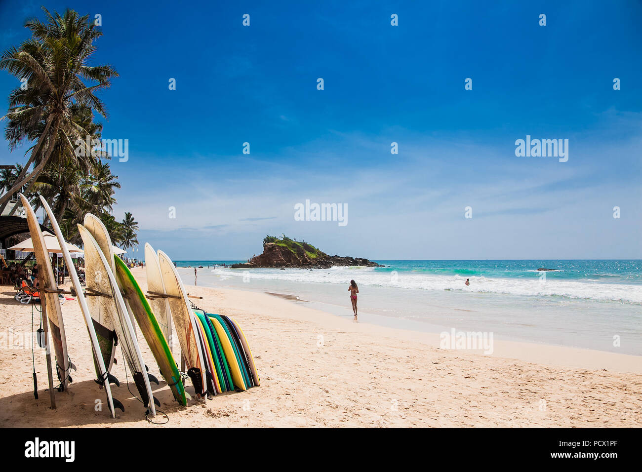 Mirissa Beach, Sri Lanka - JAN 2, 2017: Surf boards on wonderful sand ...