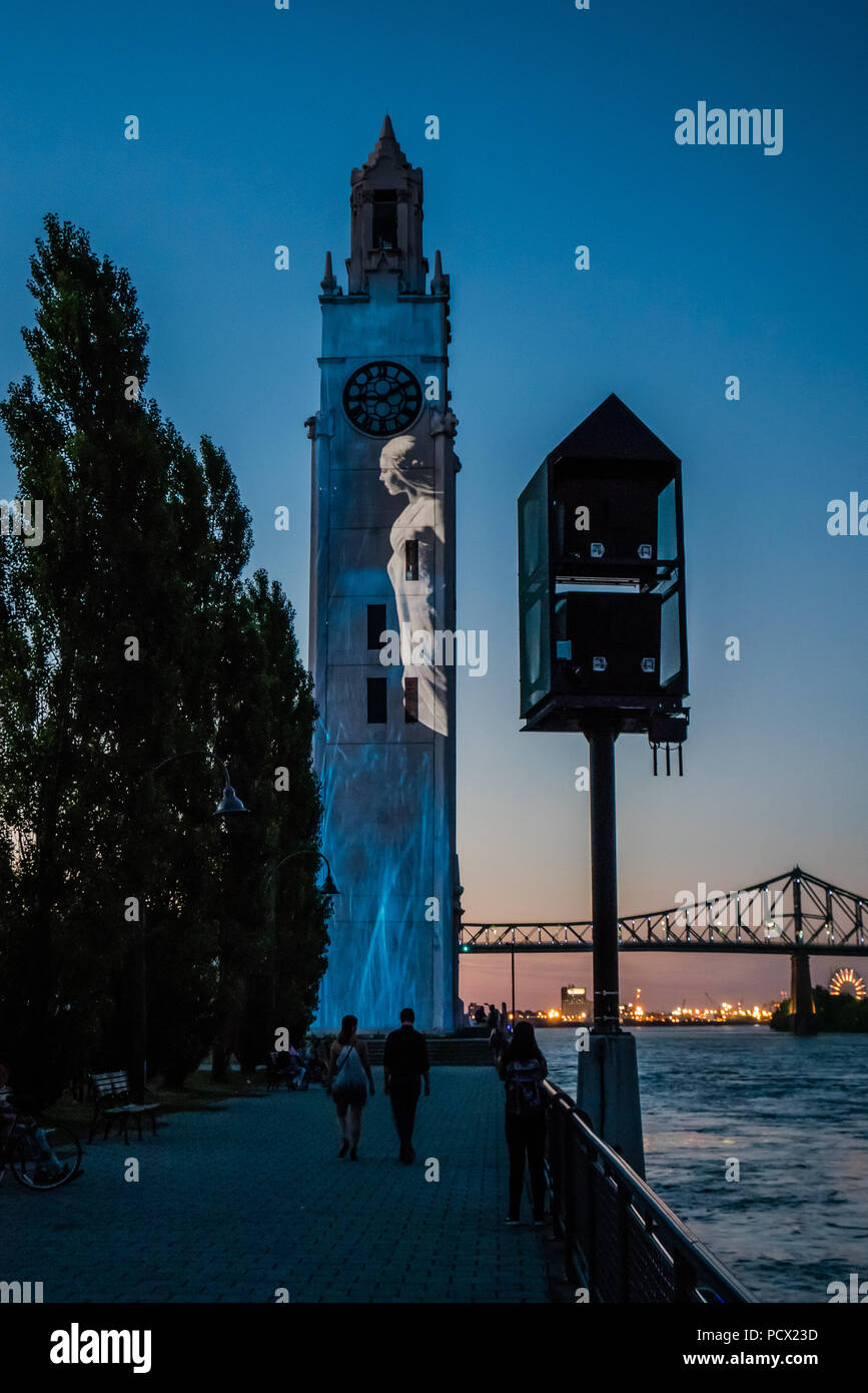 film project on montreal clock tower Stock Photo - Alamy