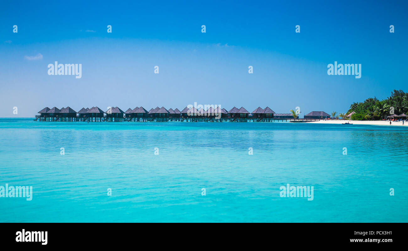 Beautiful beach with white sand at tropical Olhuveli island, south Male ...