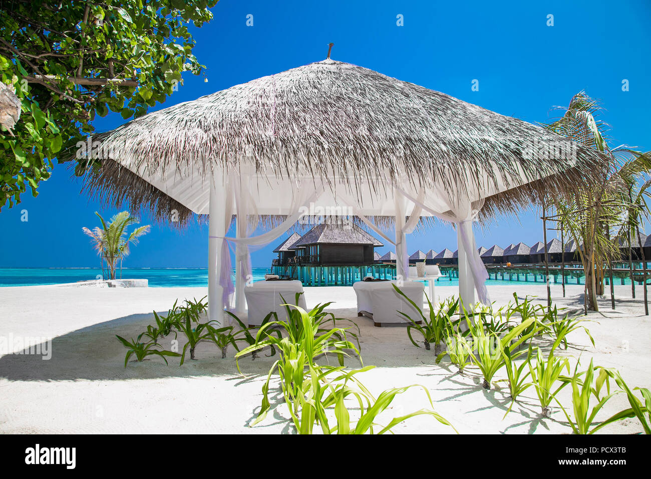 Massage Pavilion at beautiful tropical beach and turquoise water for ...