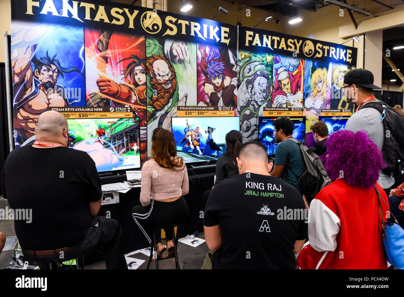 Gamer playing video game convention hi-res stock photography and images ...
