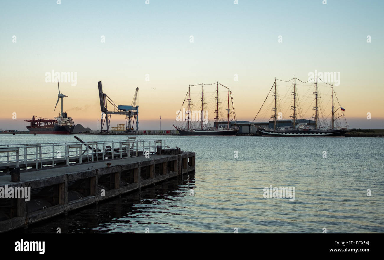 Emden, Germany. 03rd Aug, 2018. The tall ships Sedov (2-R) and ...