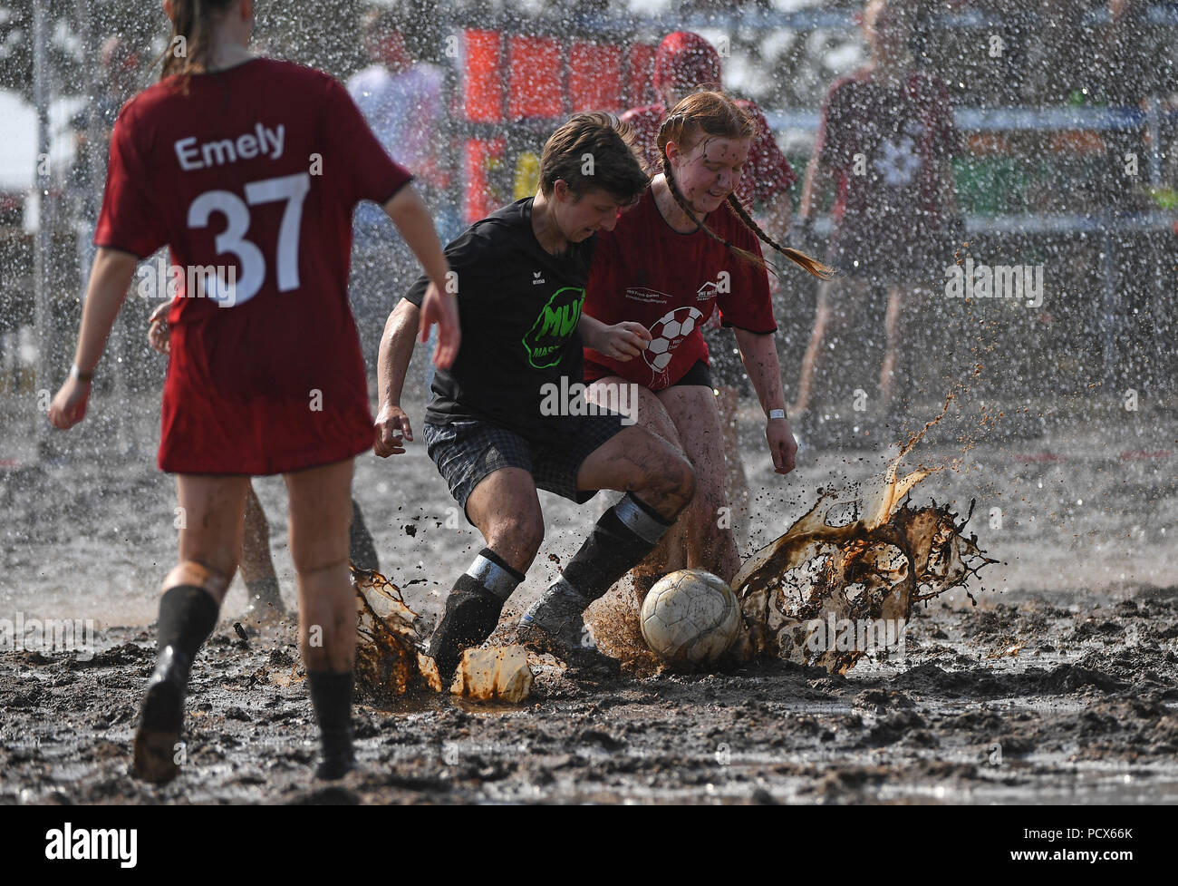 Woellnau, Germany. 04th Aug, 2018. Players of the German Mud Soccer ...