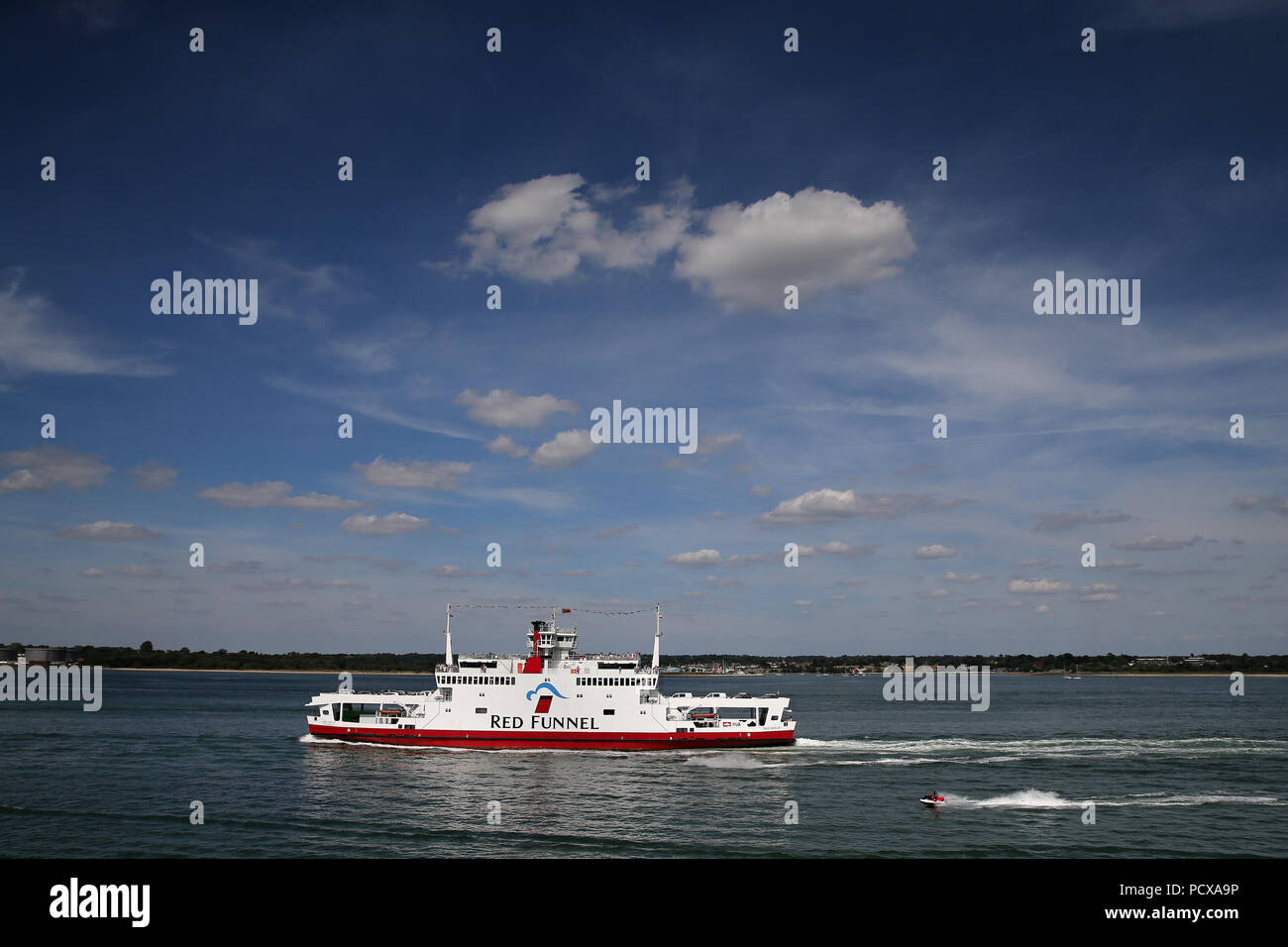 a red Funnel ferry on the Solent, Southampton returning from the Isle ...