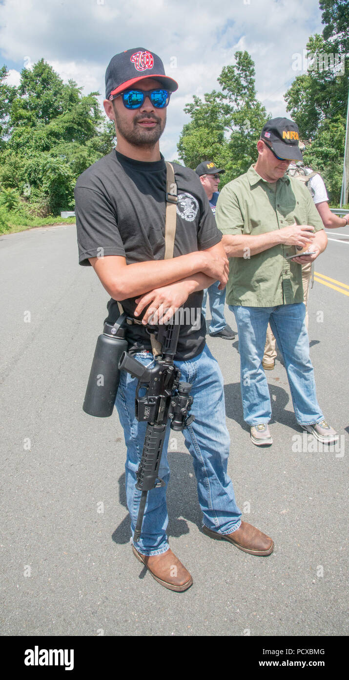 Fairfax, VA August 4 2018, USA: A pro gun supporters carries his ...