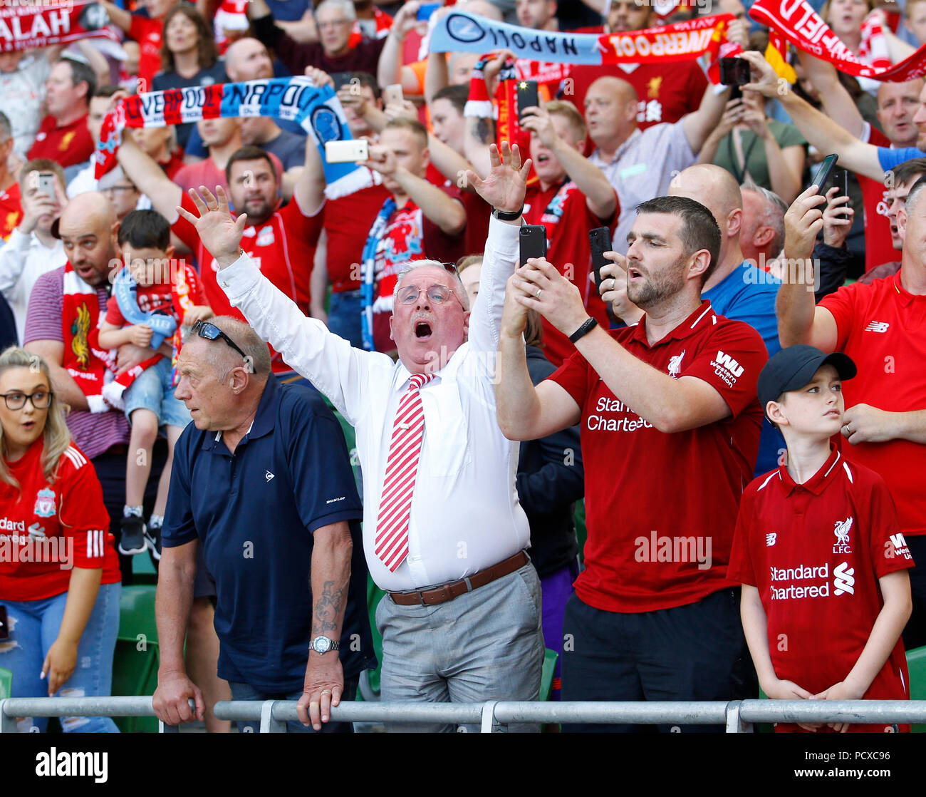 Liverpool fans cheer on their team hi-res stock photography and images ...