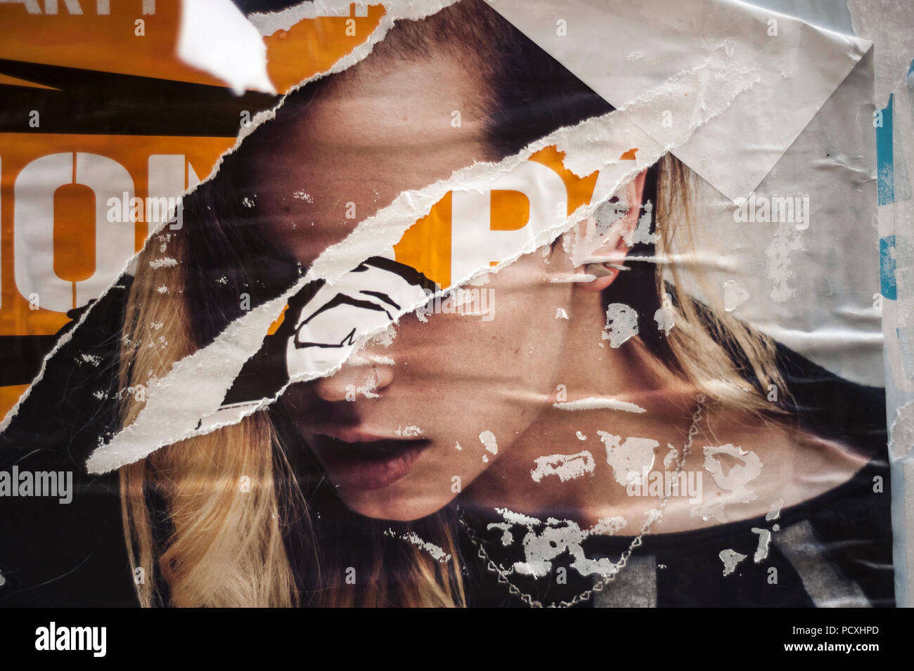 Ripped peeling posters hi-res stock photography and images - Alamy