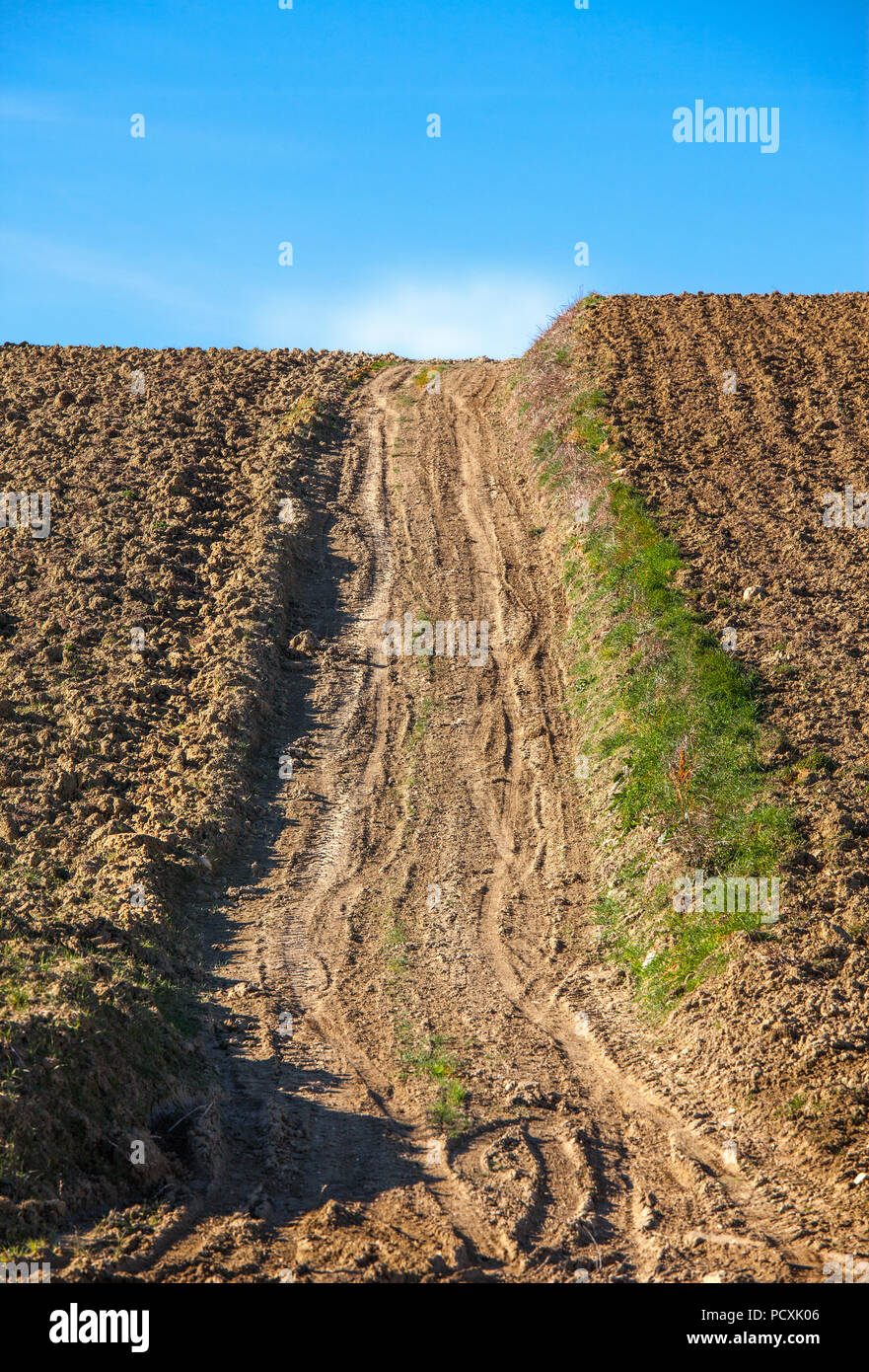 Rough road to hill hi-res stock photography and images - Alamy