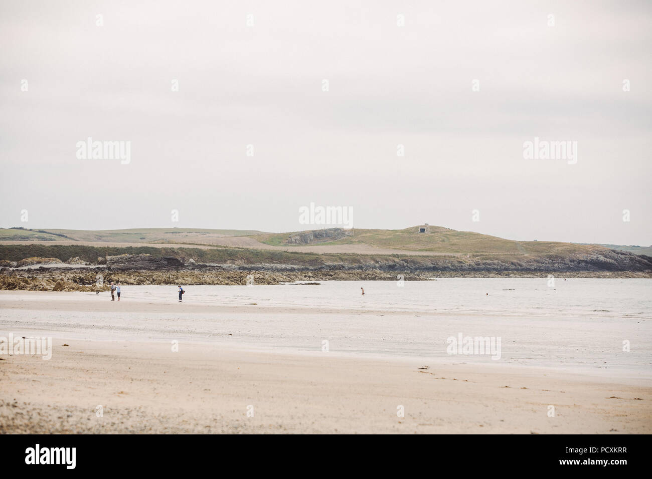 Broad Beach (Traeth Llydan) with the burial mound in the distance ...