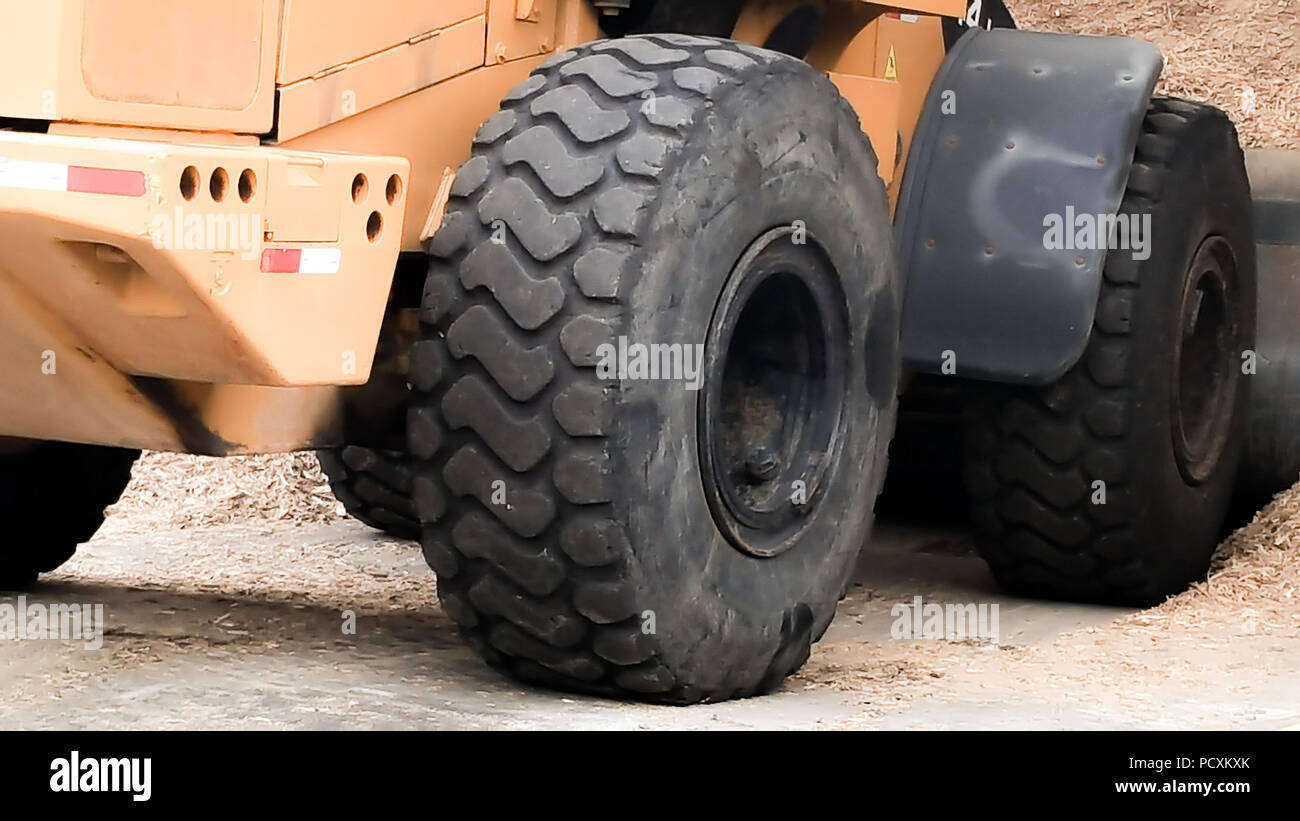 Yellow heavy truck front end loader Stock Photo - Alamy