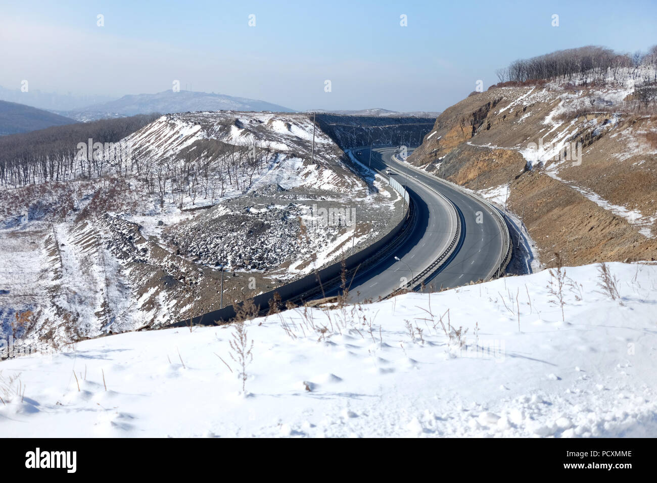 Aerial view of road covered with snow, top view Stock Photo - Alamy