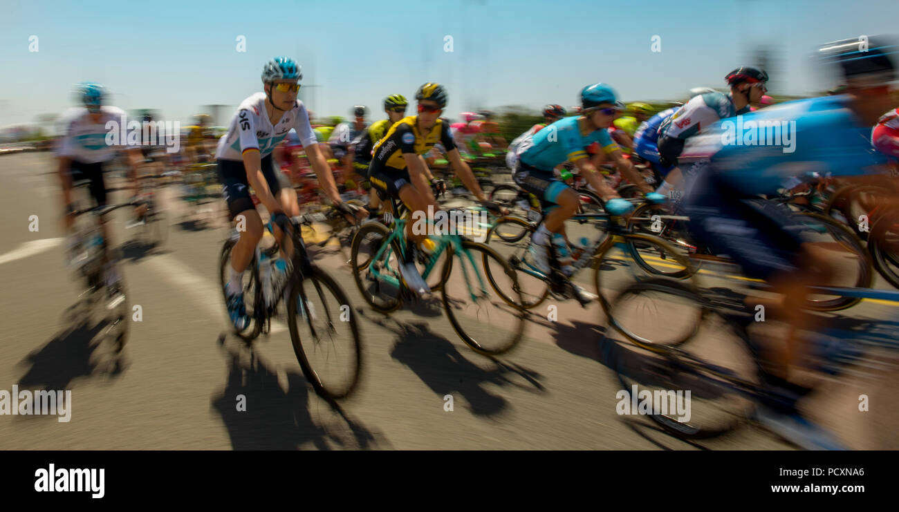 peloton of bicycle riders during a race Stock Photo - Alamy