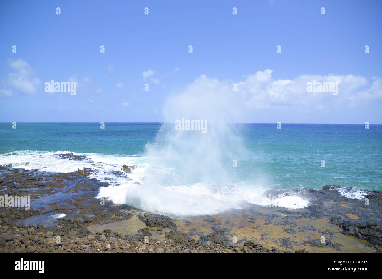 The Spouting Horn blow hole on the island of Kauai, Hawaii, United ...