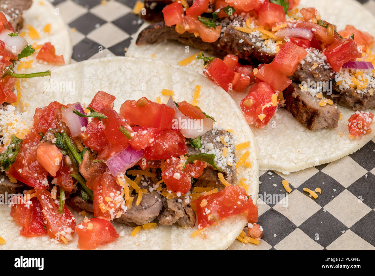 Mexican food of small mini tacos in a basket Stock Photo - Alamy