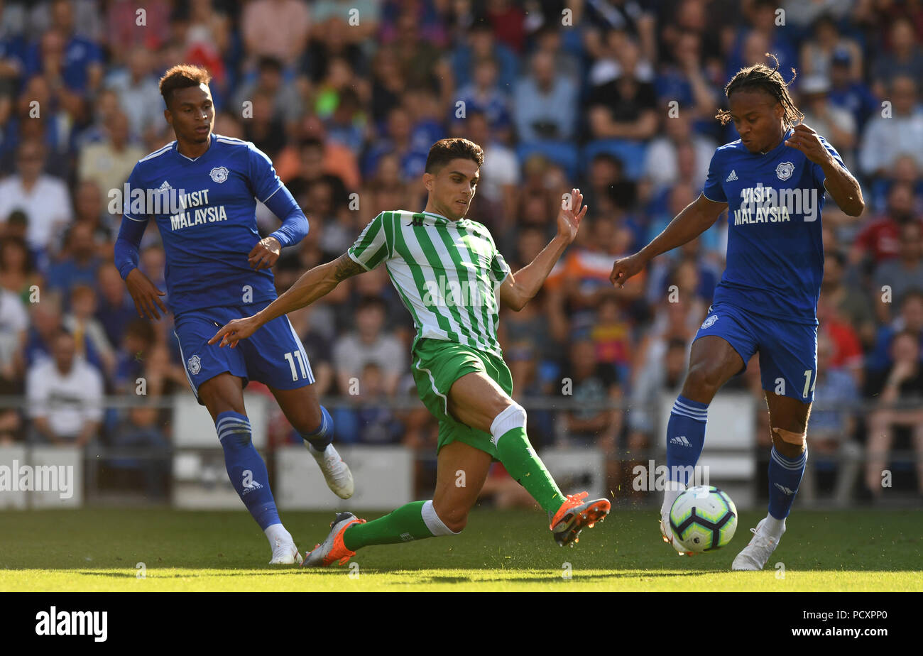 Real Betis' Marc Bartra and Cardiff City's Bobby Reid during the pre ...