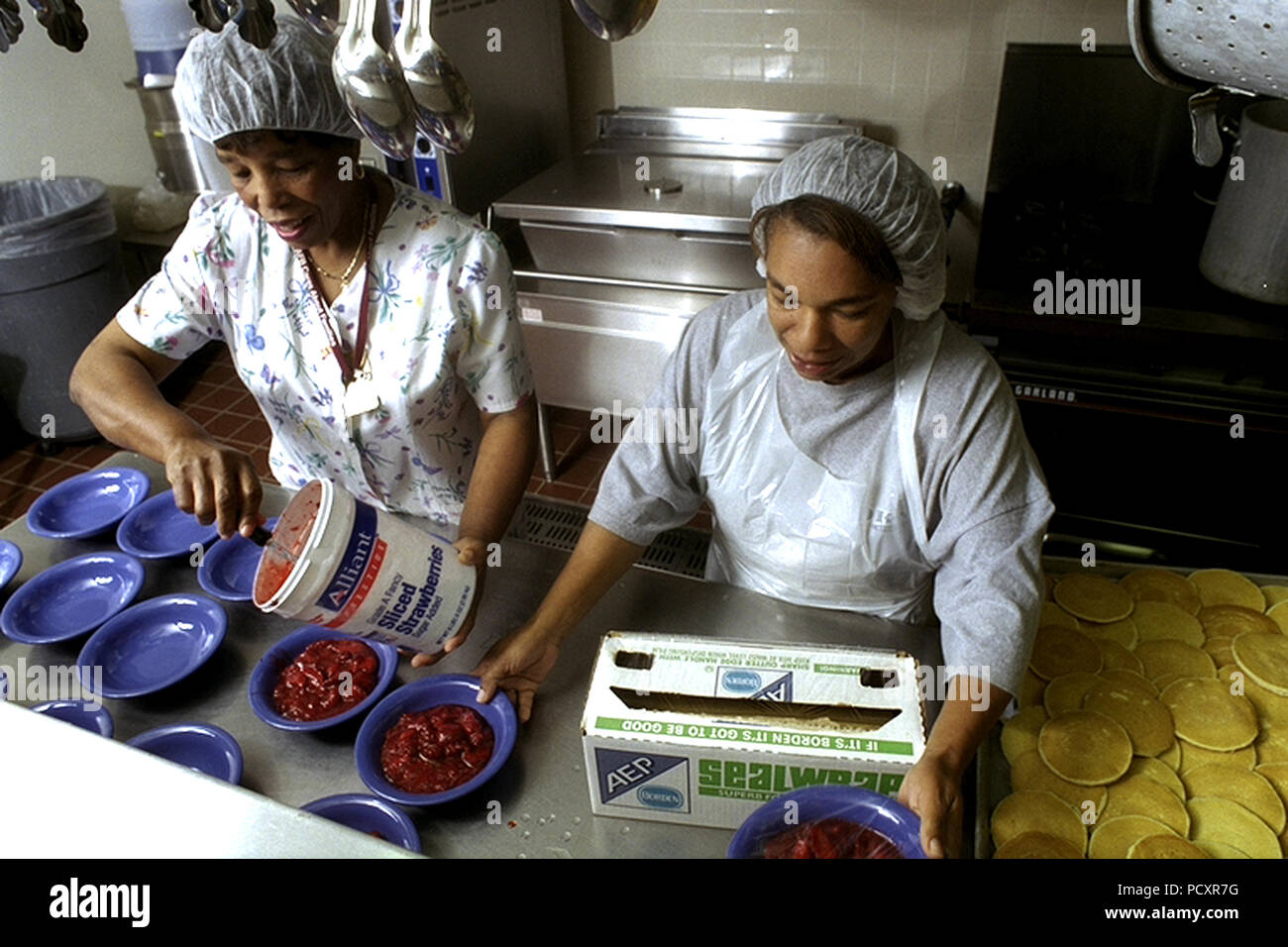 August 1999 - Food Service Personnel At Work Stock Photo - Alamy
