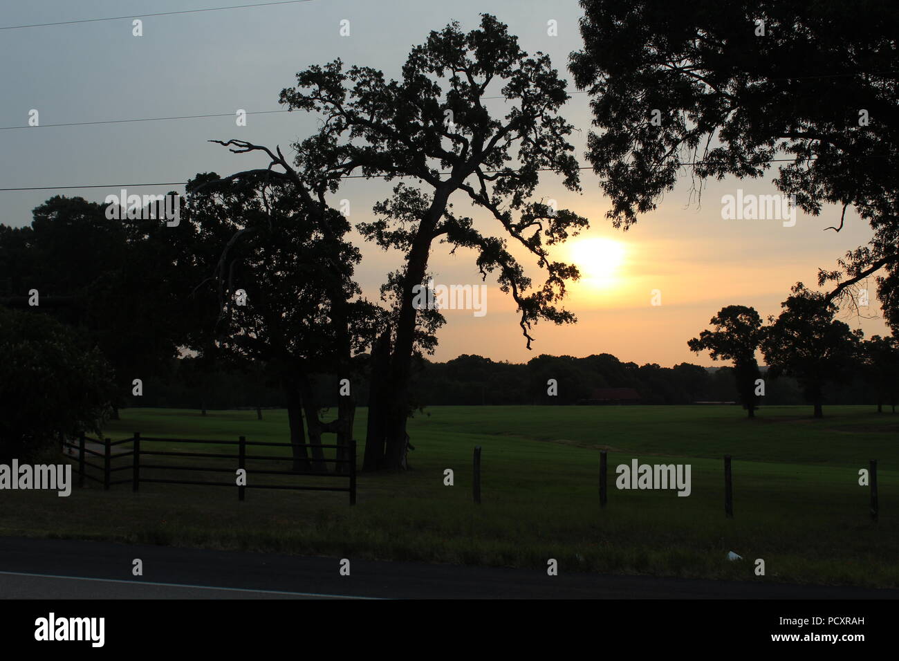 sunrise on the ranch in Texas Stock Photo - Alamy