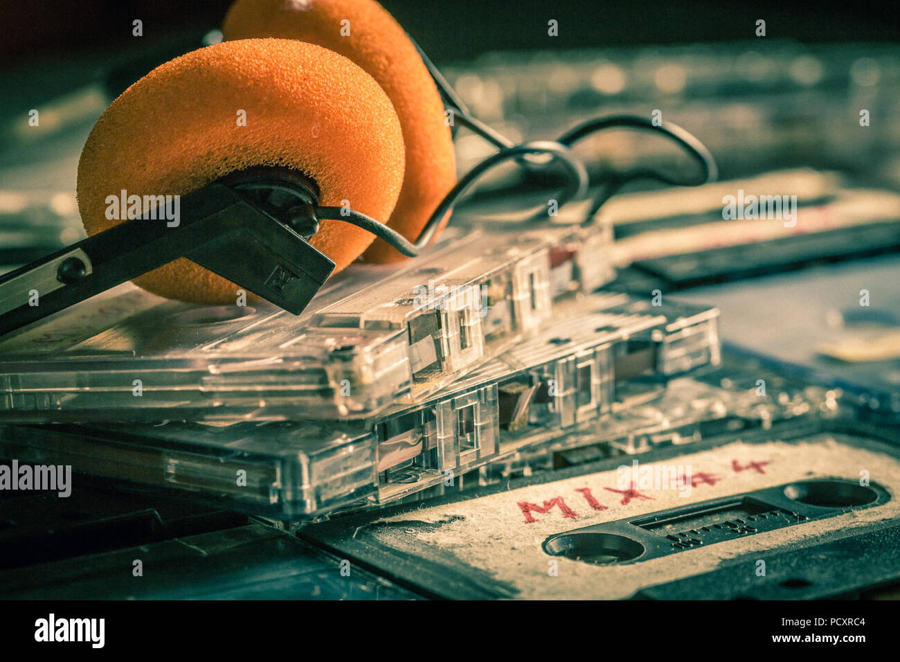 Retro pile of cassette tape on wooden table Stock Photo - Alamy