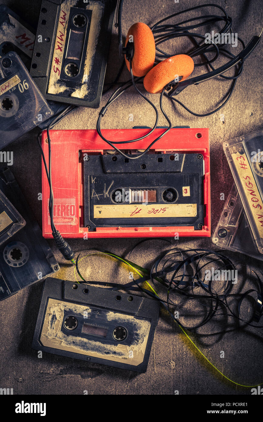 Retro audio cassette with headphones and walkman Stock Photo - Alamy