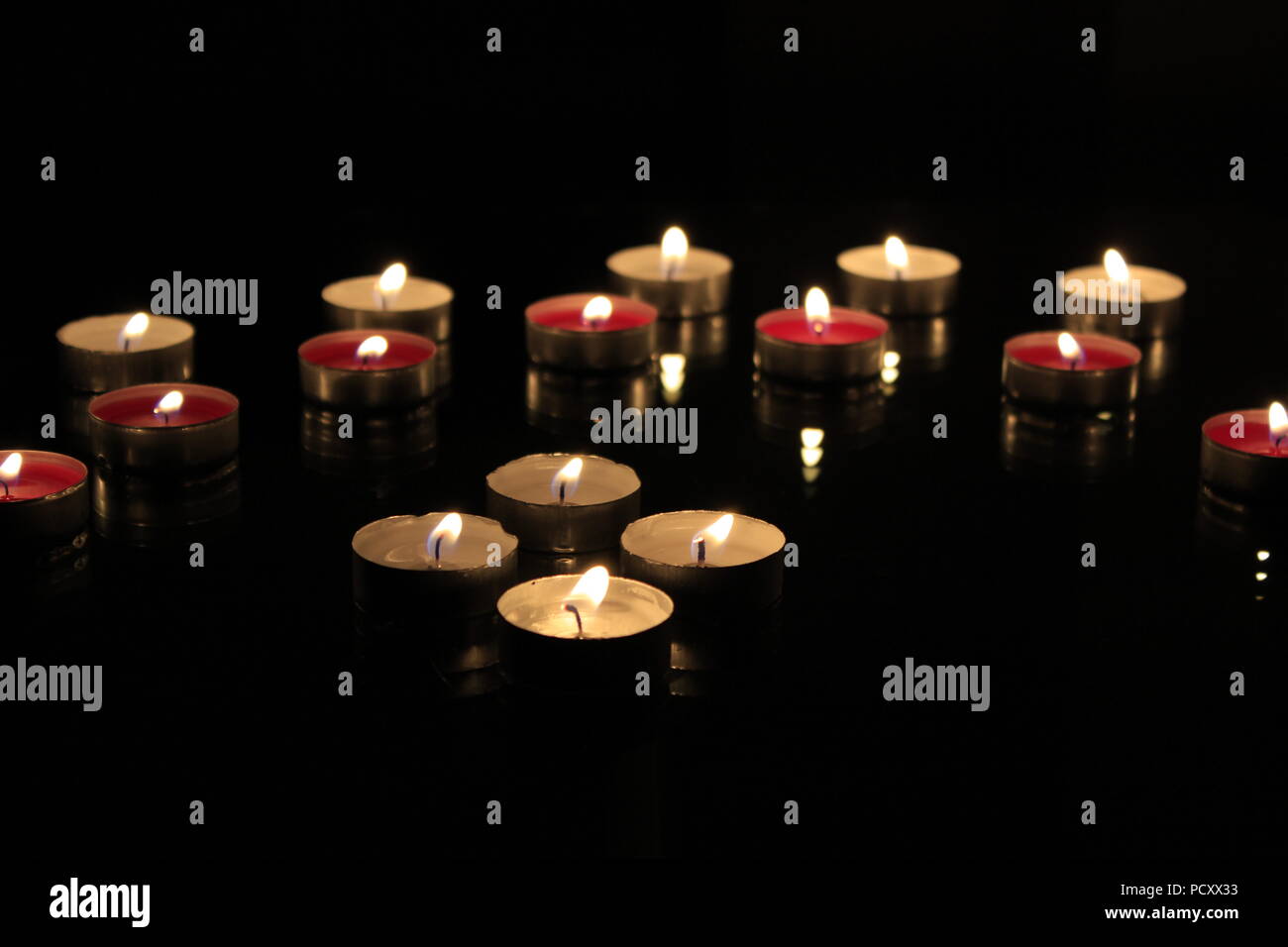 Low light candles hi-res stock photography and images - Alamy