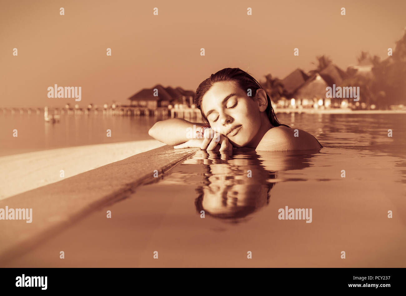 Infinity pool in maldives hi-res stock photography and images - Alamy