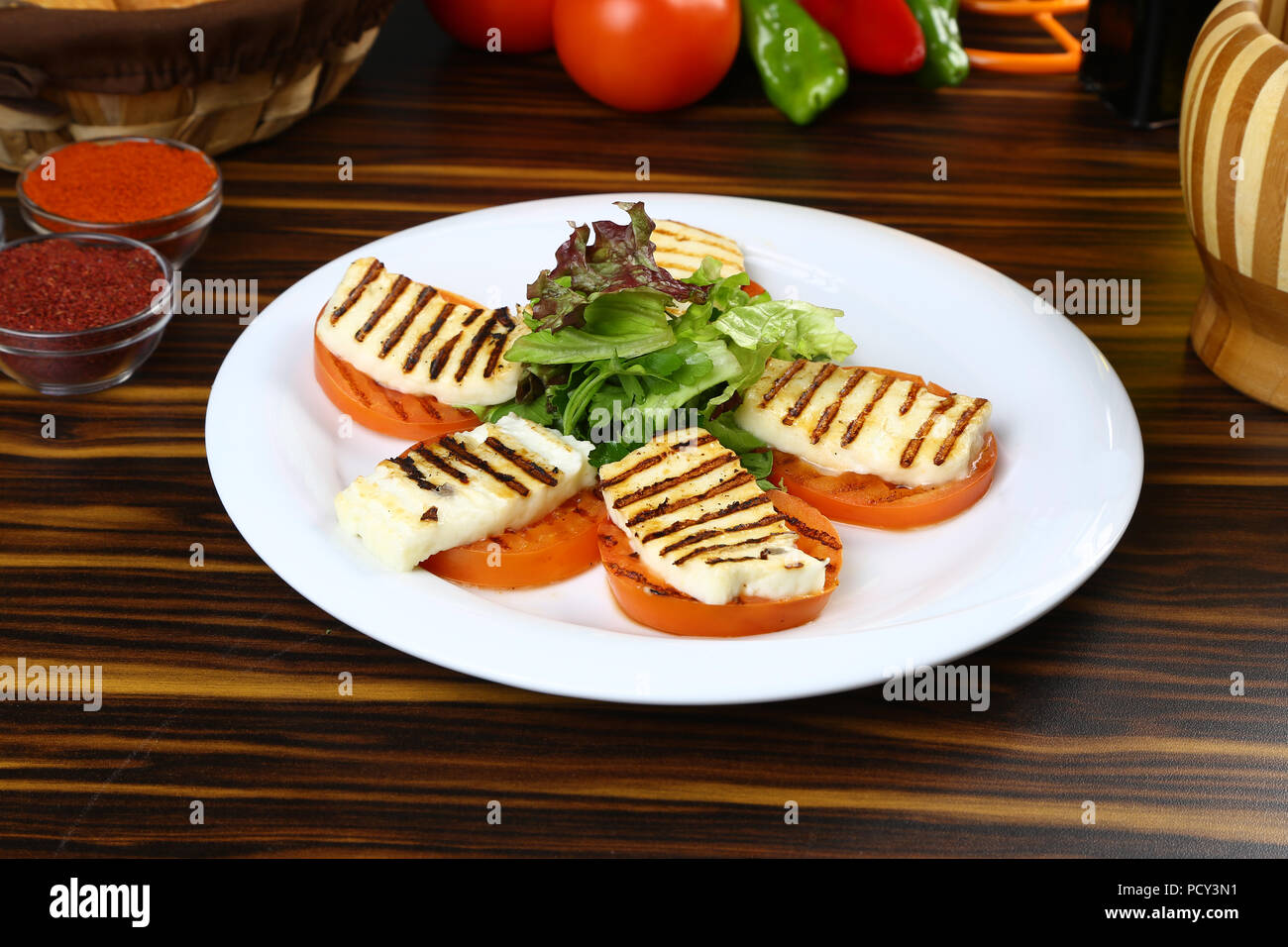 Grilled Halloumi cheese and tomato Stock Photo - Alamy