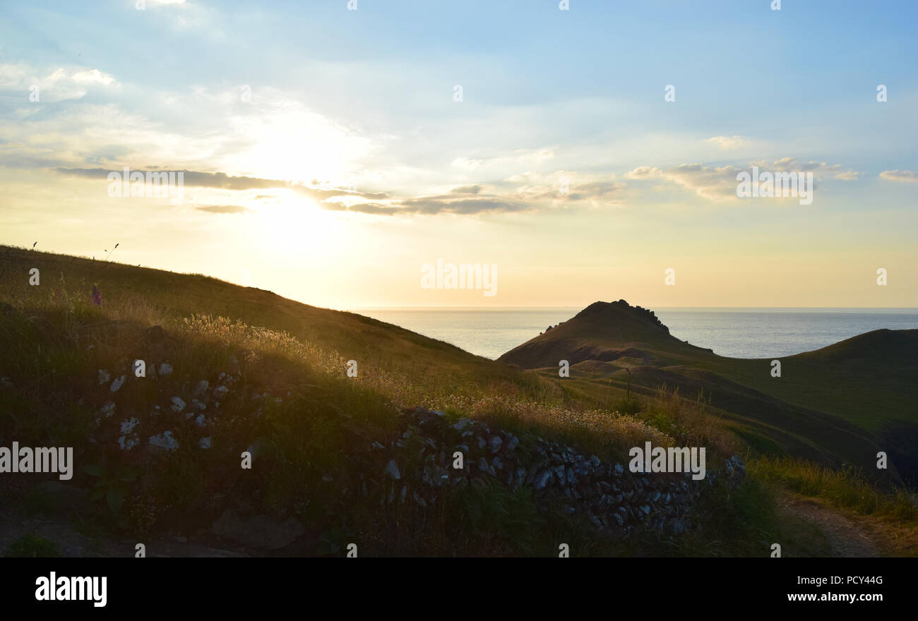 Sunset over sea, Cornwall Stock Photo - Alamy