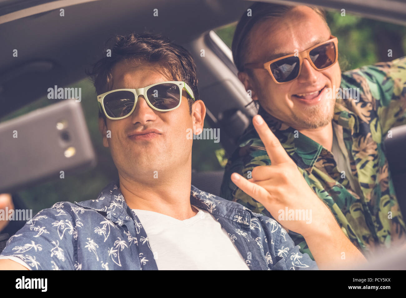 Two guys driving car hi-res stock photography and images - Alamy
