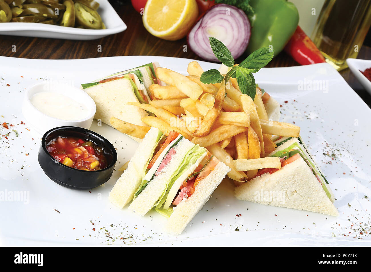 A club sandwich on a rustic table - Fresh toasted panini sandwich Stock ...