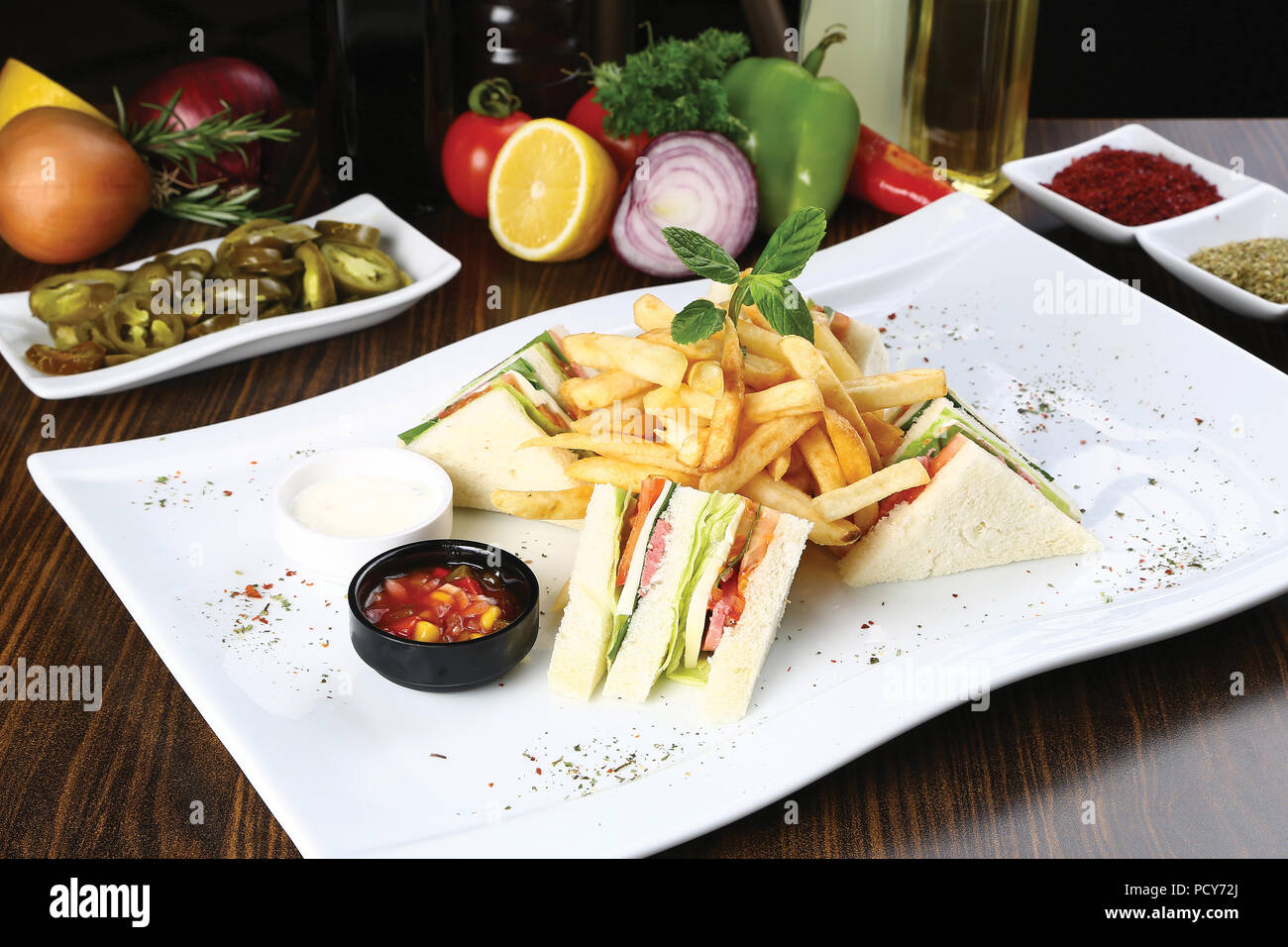 A club sandwich on a rustic table - Fresh toasted panini sandwich Stock ...