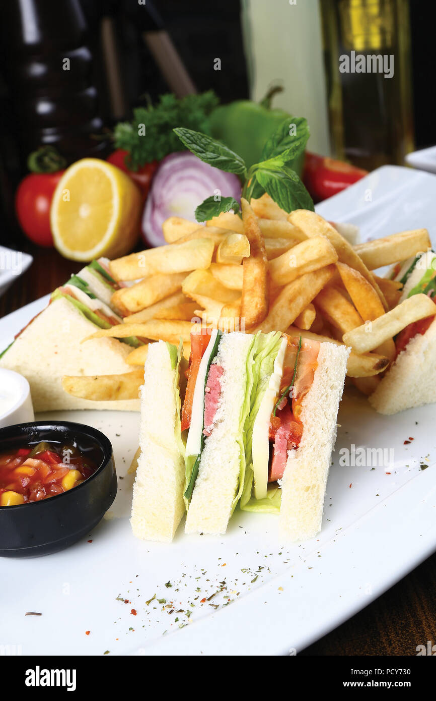 A club sandwich on a rustic table - Fresh toasted panini sandwich Stock ...
