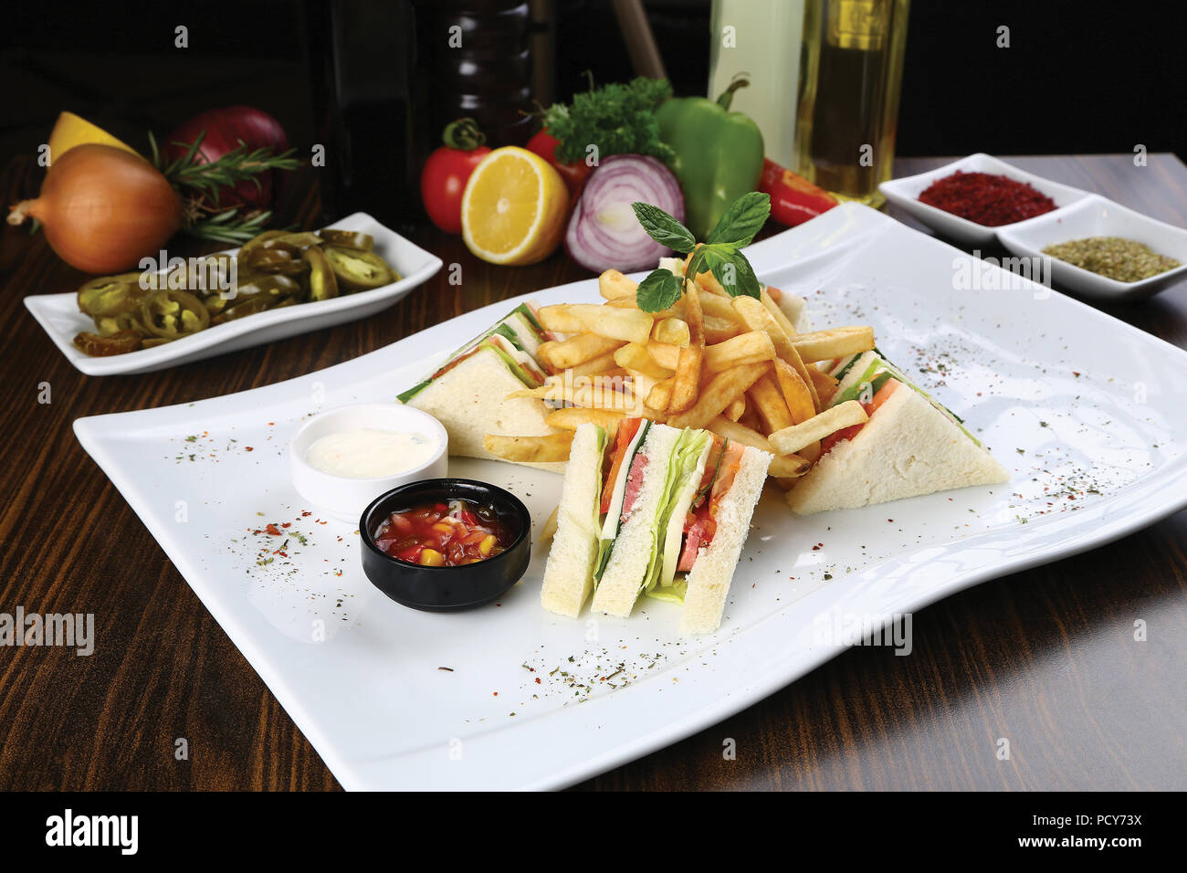 A club sandwich on a rustic table - Fresh toasted panini sandwich Stock ...