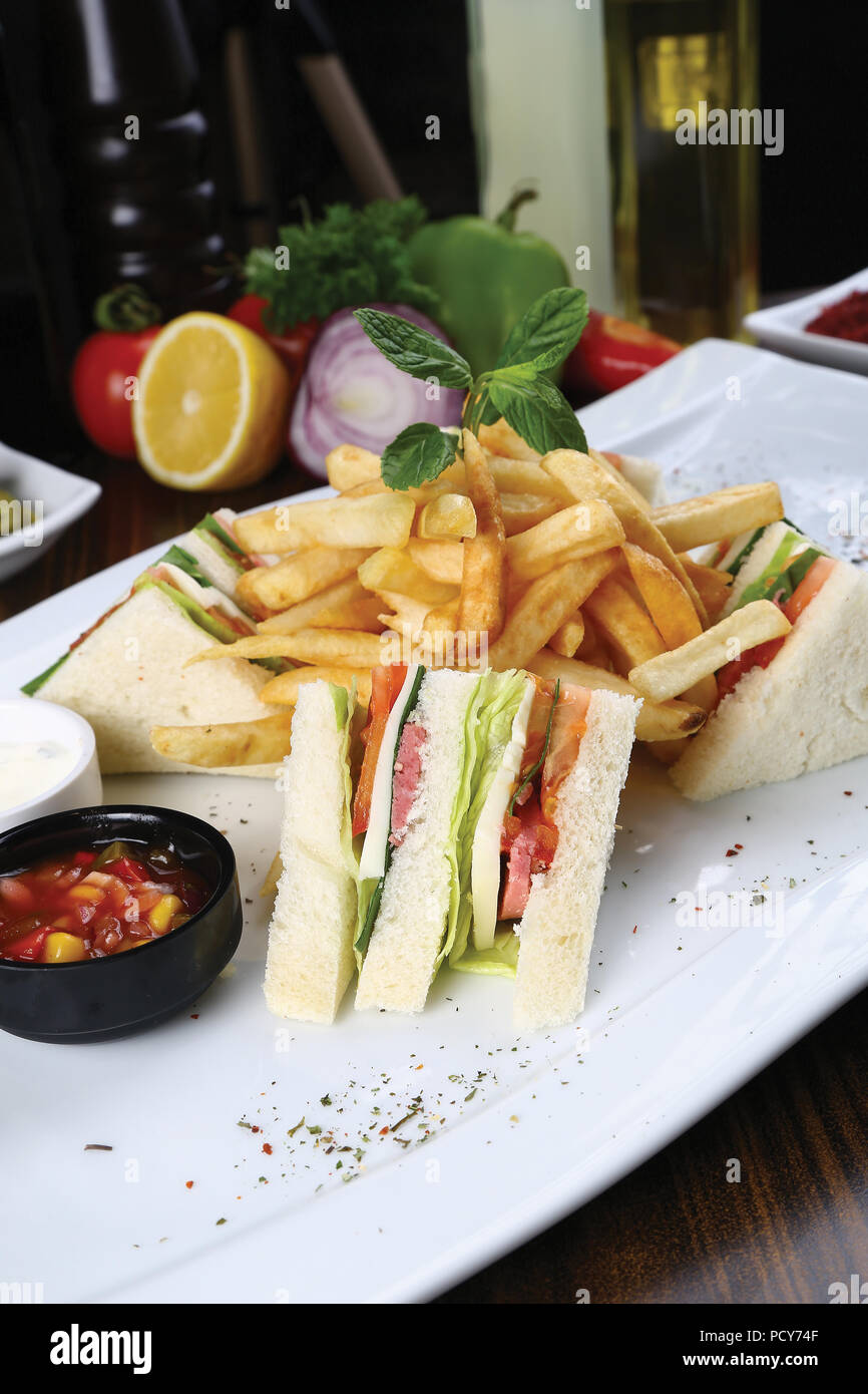 A club sandwich on a rustic table - Fresh toasted panini sandwich Stock ...