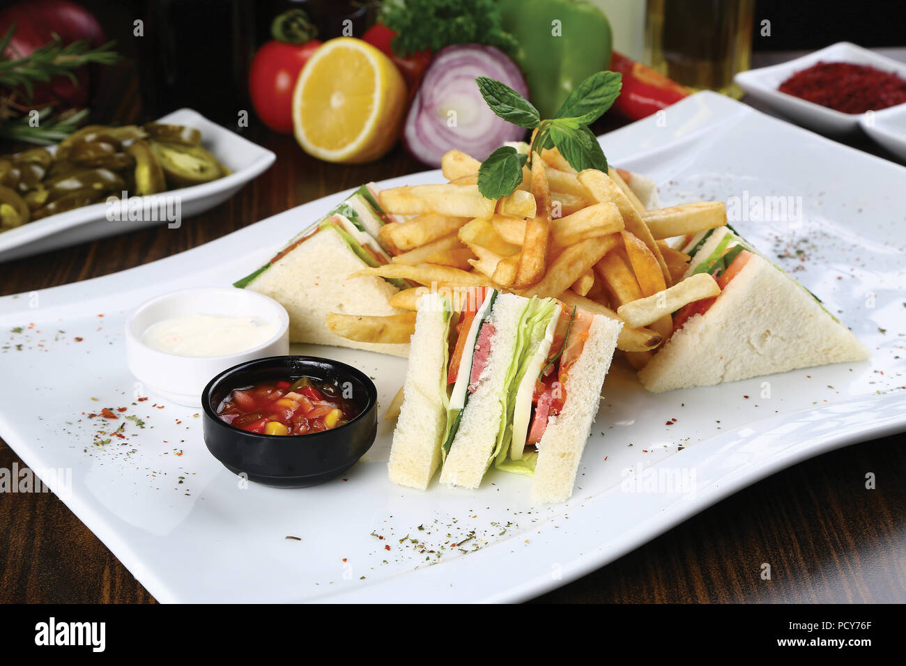 A club sandwich on a rustic table - Fresh toasted panini sandwich Stock ...