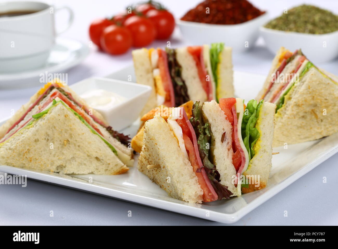 A club sandwich on a rustic table - Fresh toasted panini sandwich Stock ...