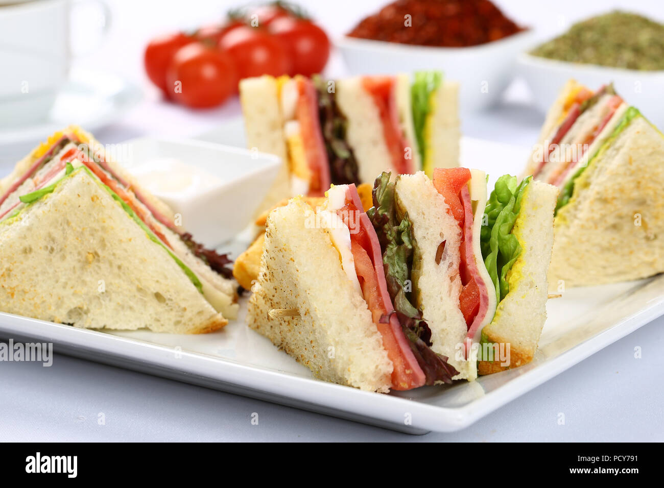 A club sandwich on a rustic table - Fresh toasted panini sandwich Stock ...