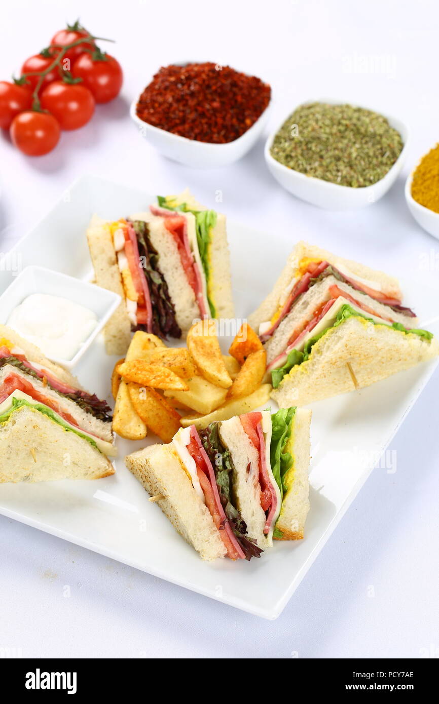 A club sandwich on a rustic table - Fresh toasted panini sandwich Stock ...