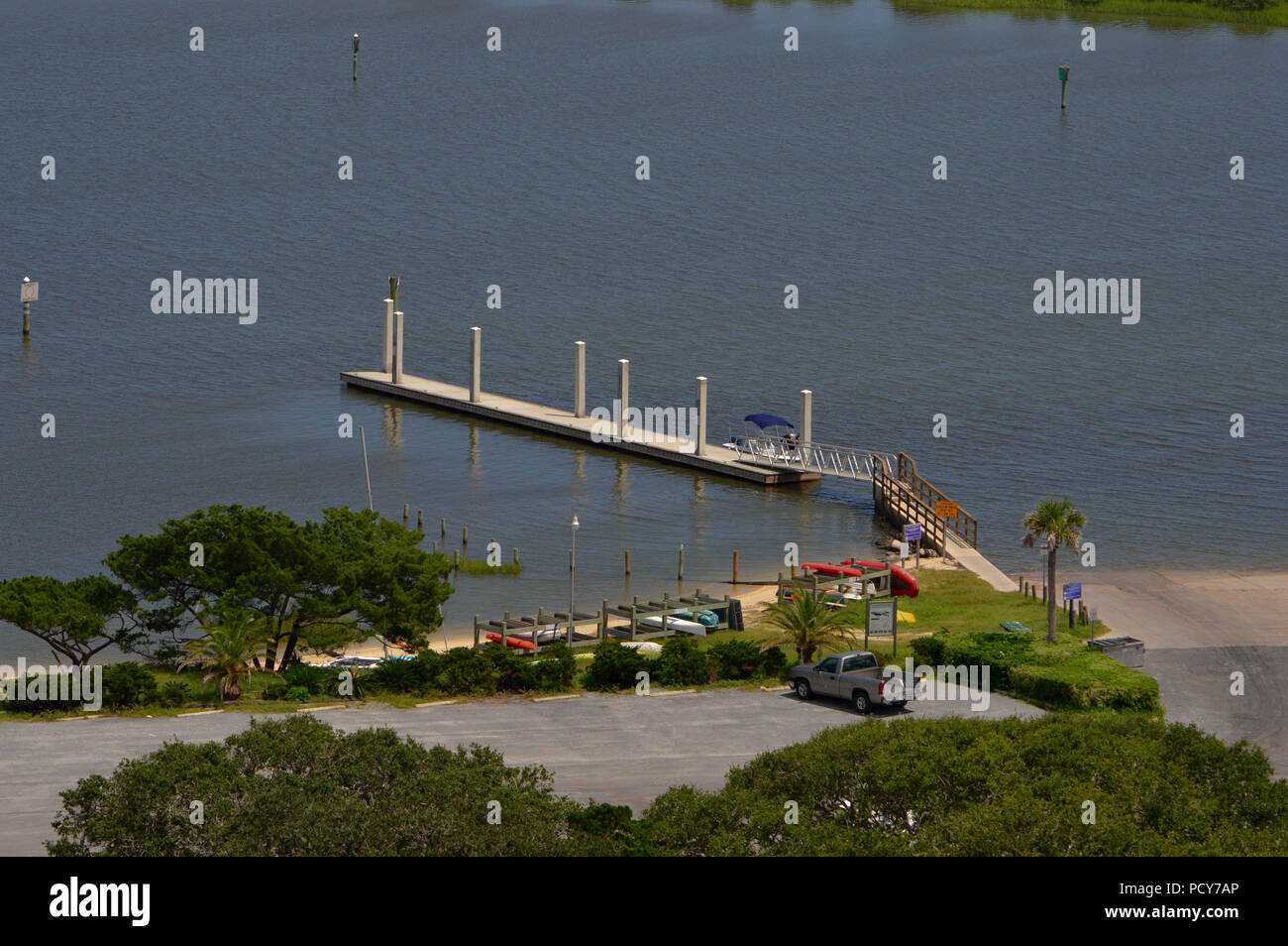 Scenic Boat Launch and Canoe Rental Park With Dock on Bay in Florida ...